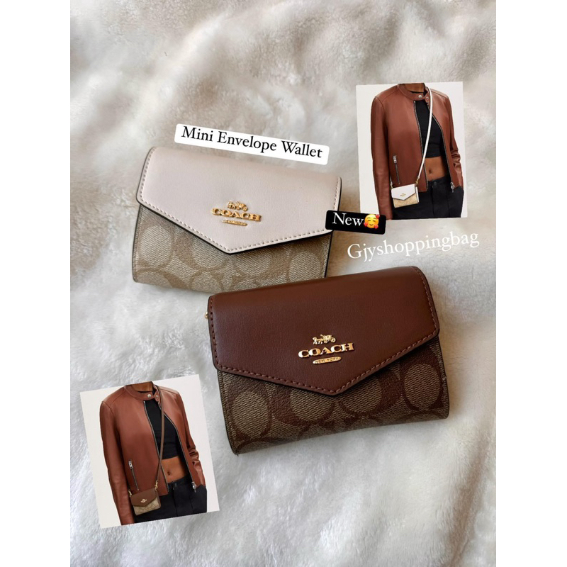 กระเป๋า Mini Envelope Wallet With Strap In Signature Canvas สีขาว ...
