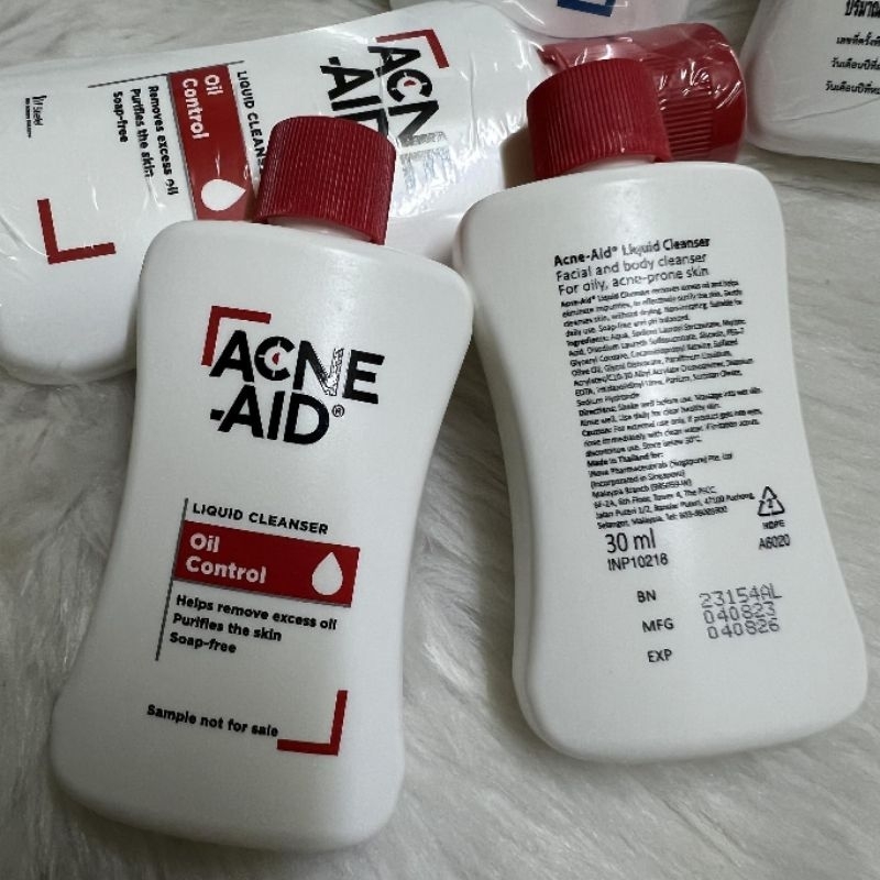 Acne aid oil control prone skin แอคเน่ เอด ขวดแดง สูตร ควบคุมความมัน สำหรับใบหน้า เป็นสิวง่าย 30 ...