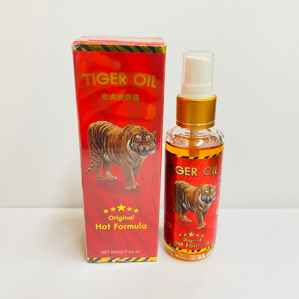 น้ำมันนวดสมุนไพร tiger oil original hot formula | Shopee Thailand