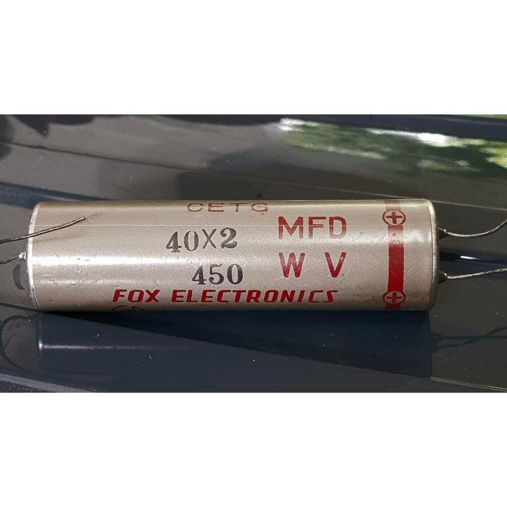 คาปาซิเตอร์ชนิดมีขั้ว มี 2 ค่า 40uf + 40 uf/ 450v เป็นของใหม่เก่าเก็บ ...