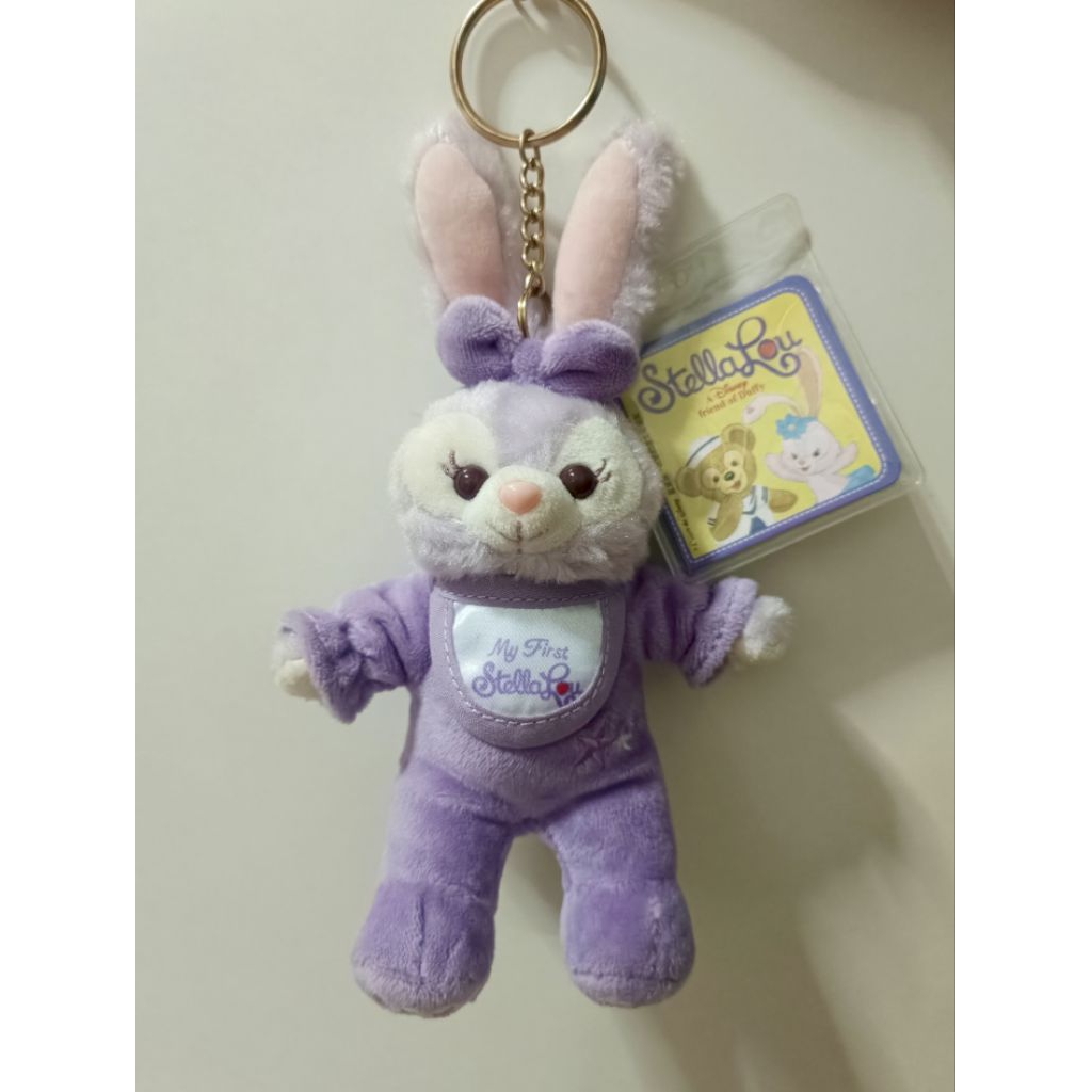 ของแท้100% พวงกุญแจ สเตลล่า Stella Lou Keychain Disneyland ชุดสีม่วง เบ ...