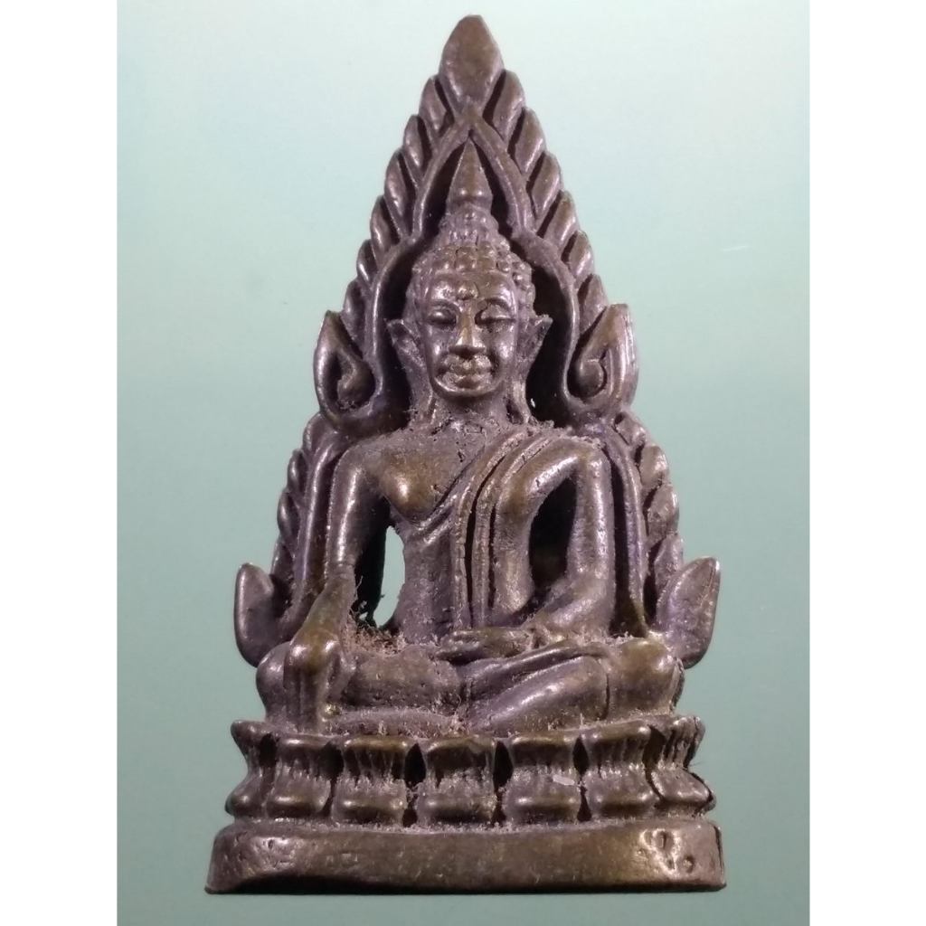 Antig Sun 3118 รูปหล่อพระพุทธชินราช ด้านหลังที่ฐาน มีตราสัญลักษณ์เครื่องหมายอกเลา วัดพระศรีรัตนม ...