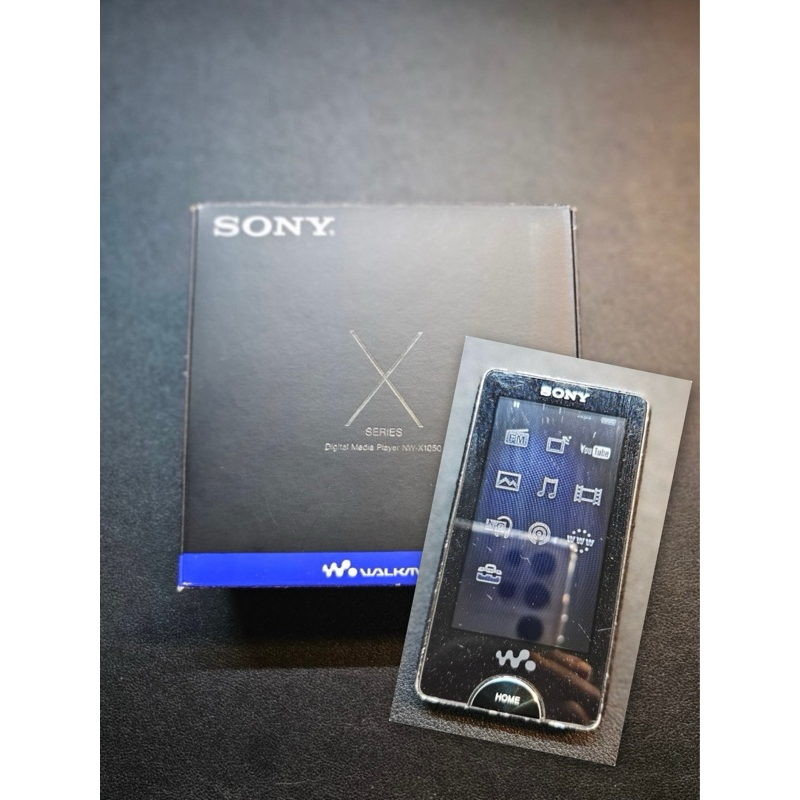 (Used มีกล่อง ใช้งานได้ปกติ) Sony NW X1050 16 GB (สีดำ) มีรอยถลอกตามตัวขอบเครื่องบ้าง มุมบิ่น ...