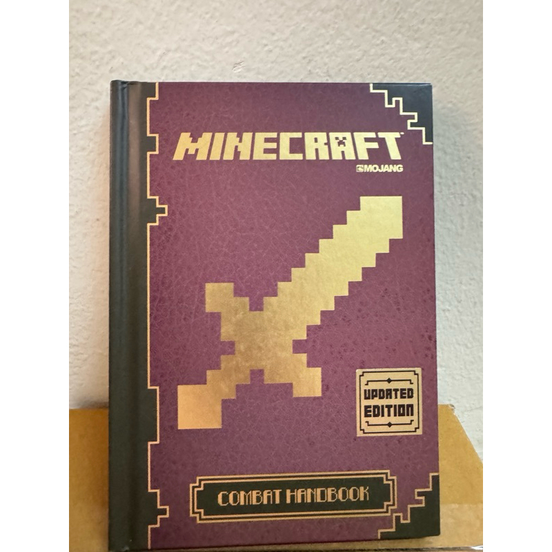 MINECRAFT COMBAT HANDBOOK (ปกแข็ง) | Shopee Thailand