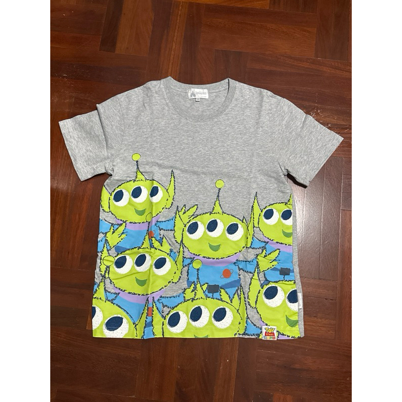 เสื้อยืด greeman (toy story) จาก Hongkong disney land | Shopee Thailand