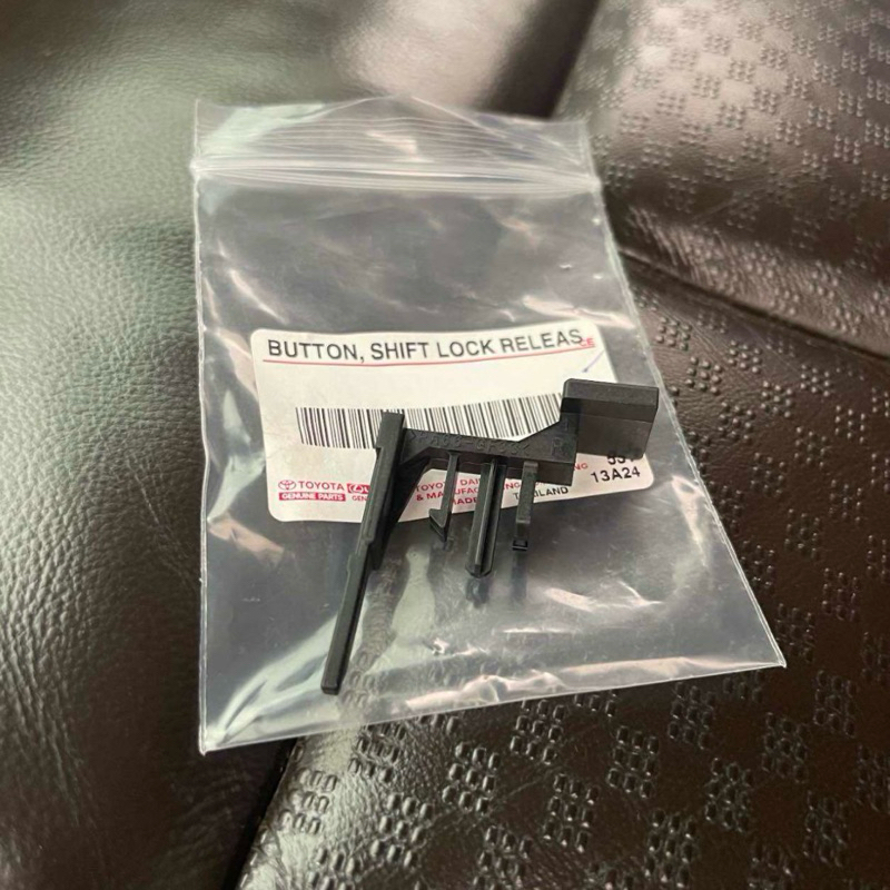 แท้ศูนย์ 💯% BUTTON, SHIFT LOCK RELEAS บู๊ชล็อคด้ามเกียร์ Yaris Vios ...