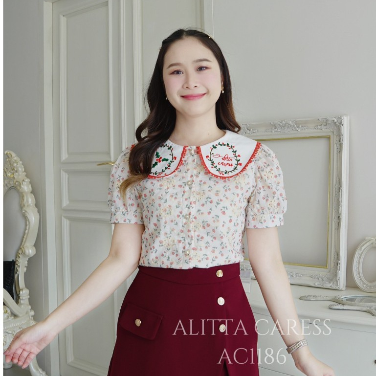 ALITTA CARESS : AC1186 เสื้อสีครีมพิมพ์ลายดอก ปกขาวปักขอบเเดง ปักAC ...