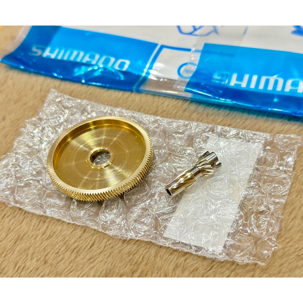 อะไหล่รอก Shimano ชุดเฟือง (เฟืองขับ+เฟืองพีเนียน) 21 CURADO MGL 150 / ...
