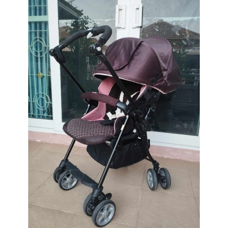 🤎🖤รถเข็นเด็ก Combi รุ่น Miracle Turn Auto 4 🖤🤎ลายหลุยส์ มือสองจากญี่ปุ่น | Shopee Thailand