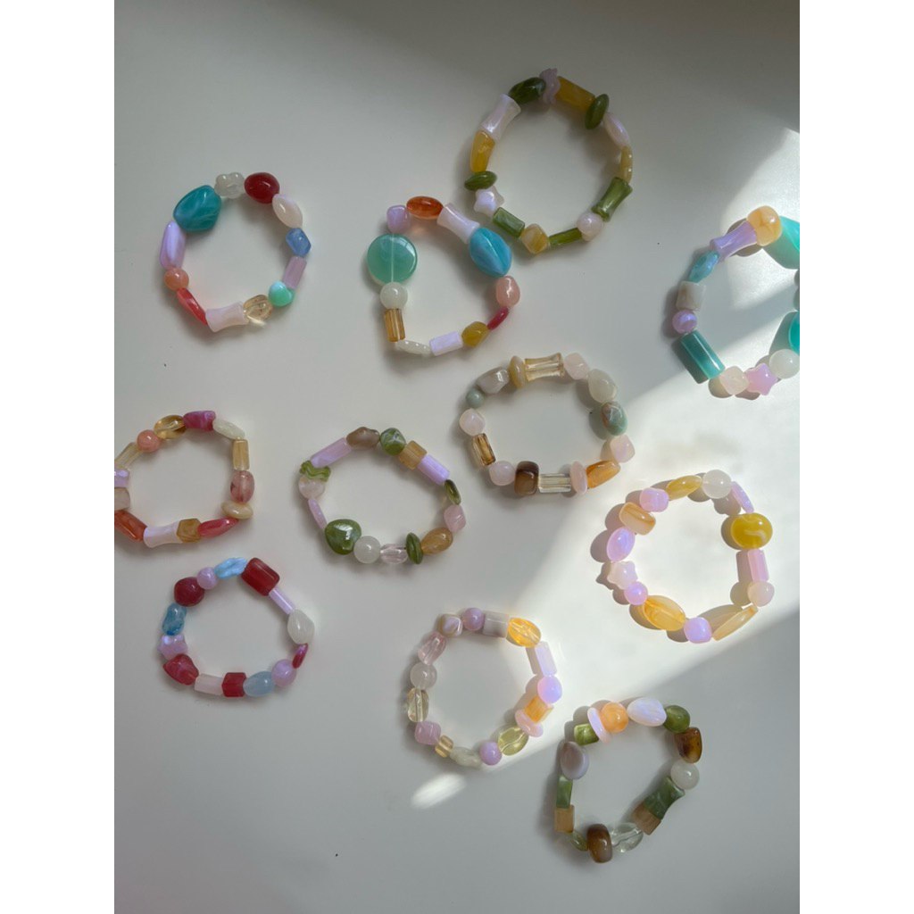 SMB - กำไลยืดลูกปัดเรซิ่น Jelly Bracelet🧢🚁🎟️🫒 | Shopee Thailand