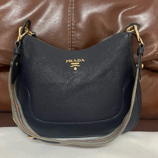 กระเป๋ามือสองแบรนด์ prad A หนังแท้ มีแท็กสีขาว | Shopee Thailand