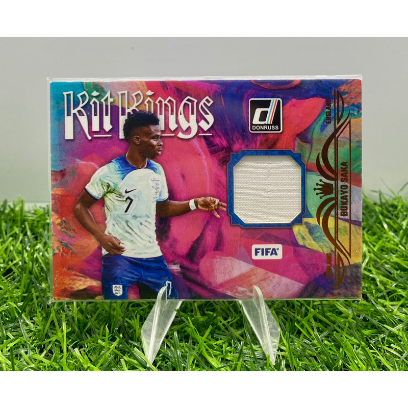 การ์ดฟุตบอล👕ชิ้นส่วนผ้า BUKAYO SAKA Kit Kings 2023-24 PANINI-DONRUSS ...