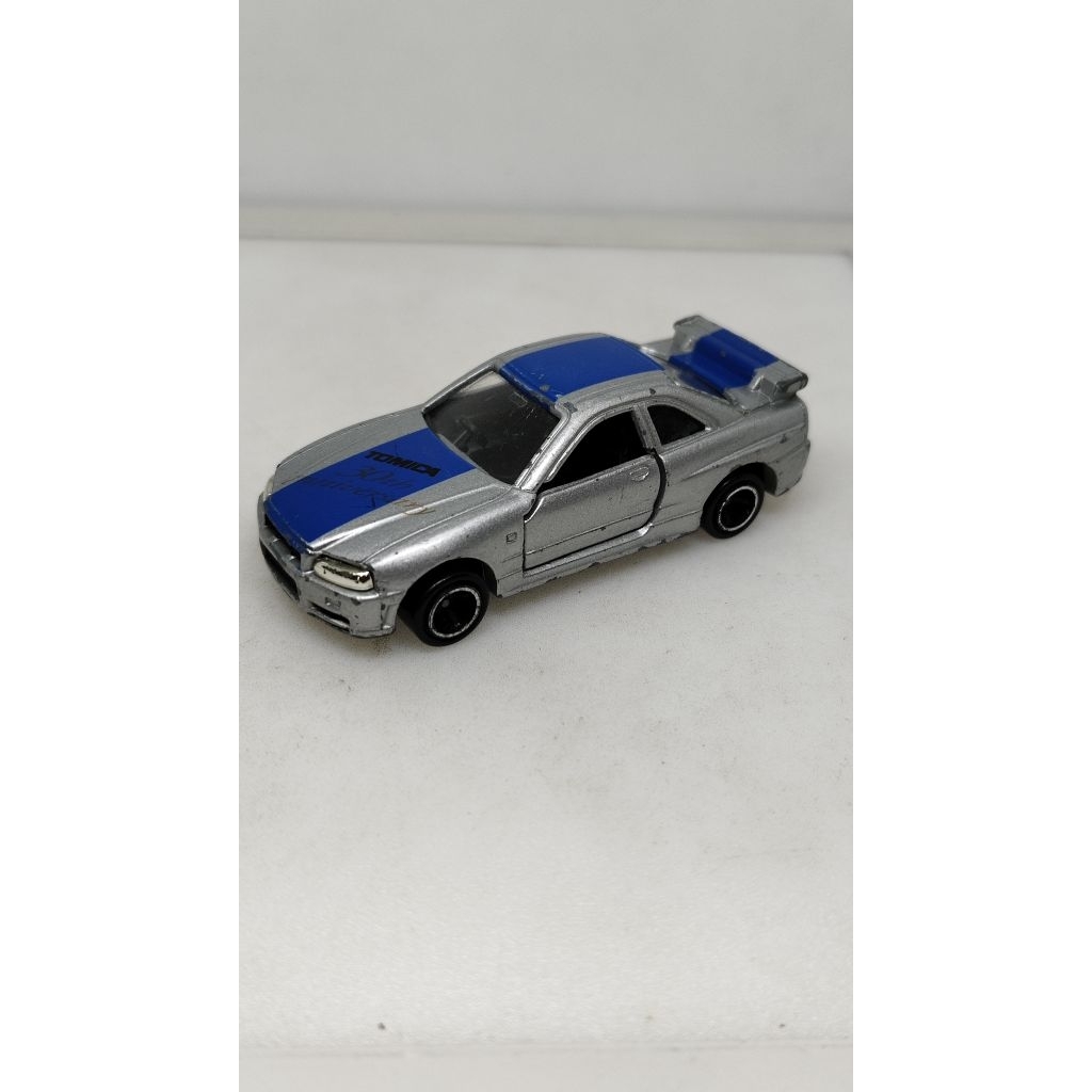 🔵🔵UN01 โมเดลรถเหล็ก TOMICA NISSAN SKYLINE GT-R R34 | Shopee Thailand