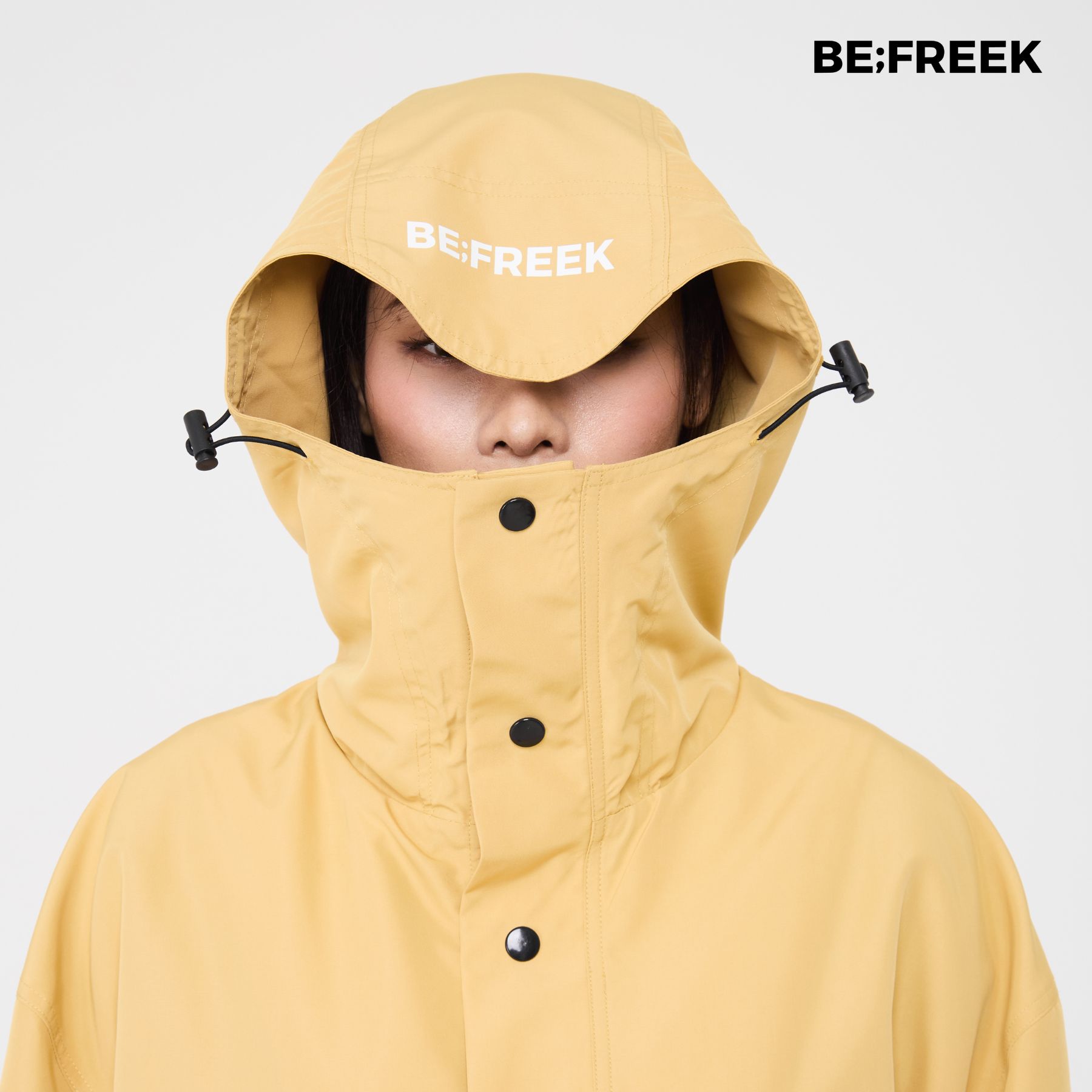 BE;FREEK Basic Logo Rain Coat Mustard | Shopee Thailand