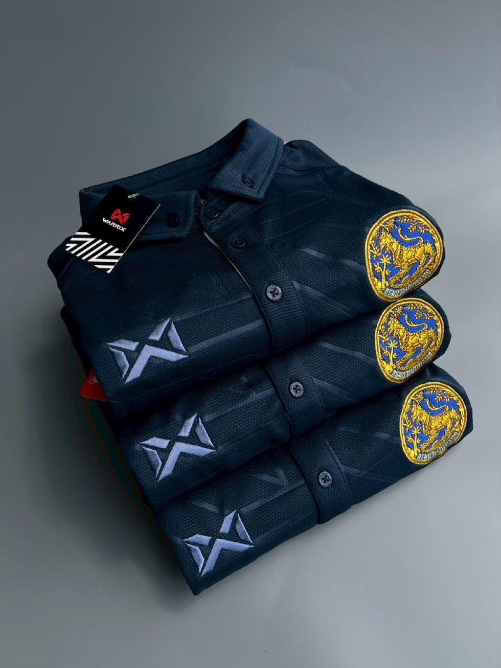 เสื้อโปโลwarrix รุ่น vividus พร้อมปักกรมปกครอง ของเเท้ | Shopee Thailand